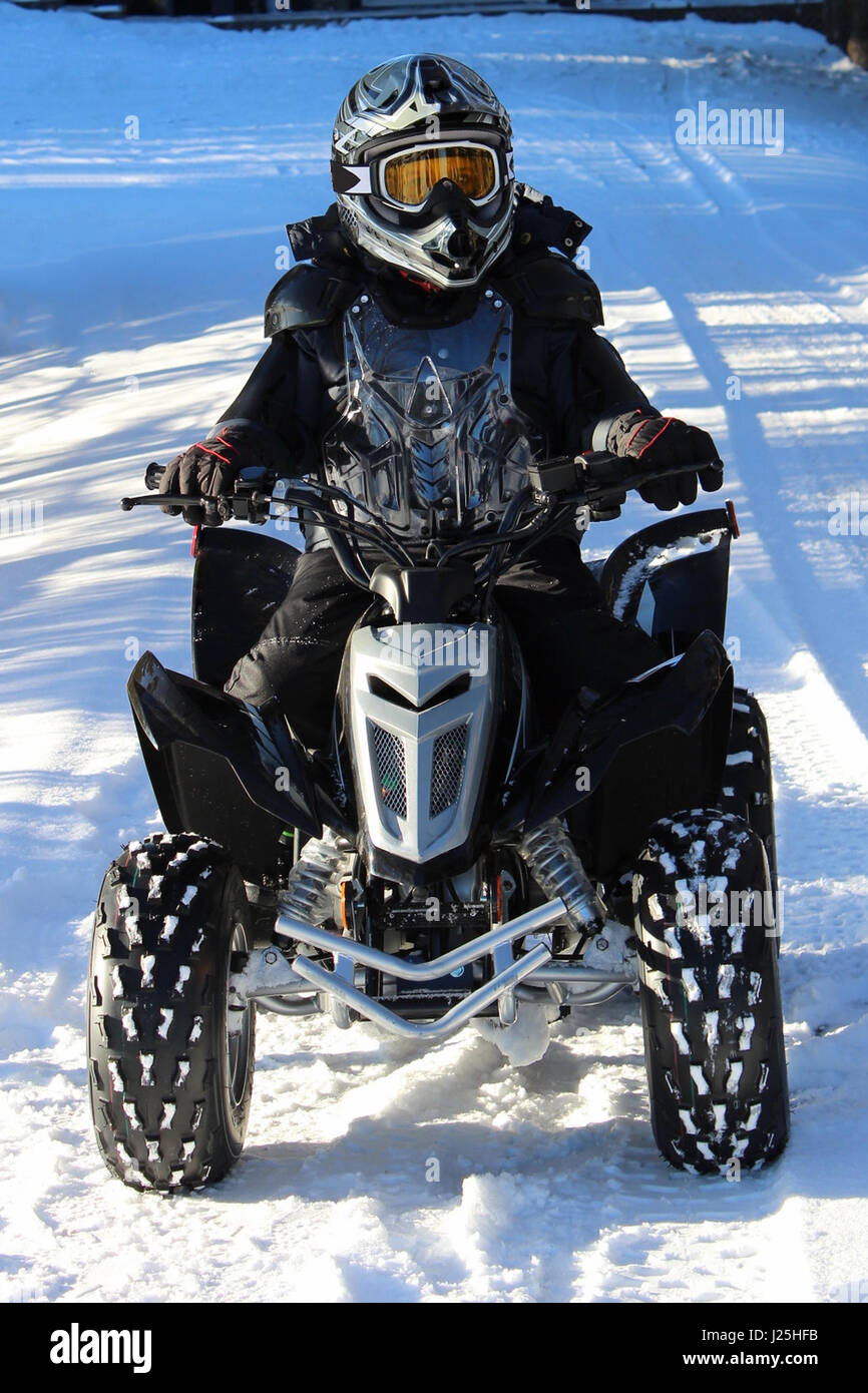 Winter Quading in Full Gear Stock Photo - Alamy