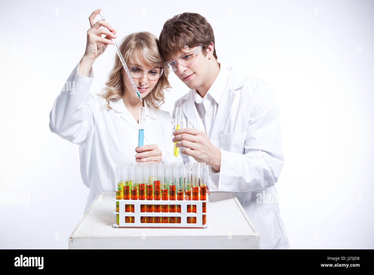 A shot of a male and female caucasian scientists Stock Photo - Alamy