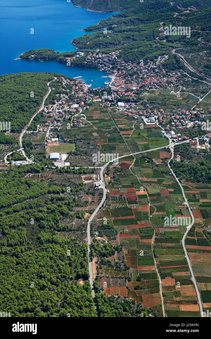 Aerial view of Jelsa town and the countryside on Hvar island, Croatia ...