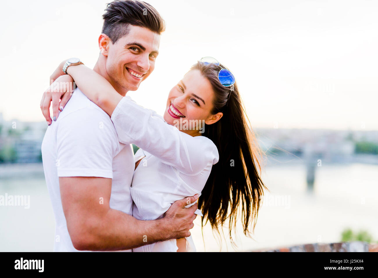 Young and beautiful couple in love bonding with each other Stock Photo ...