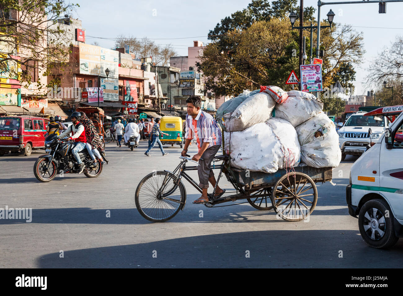 Indian man carrying sack hi-res stock photography and images - Alamy