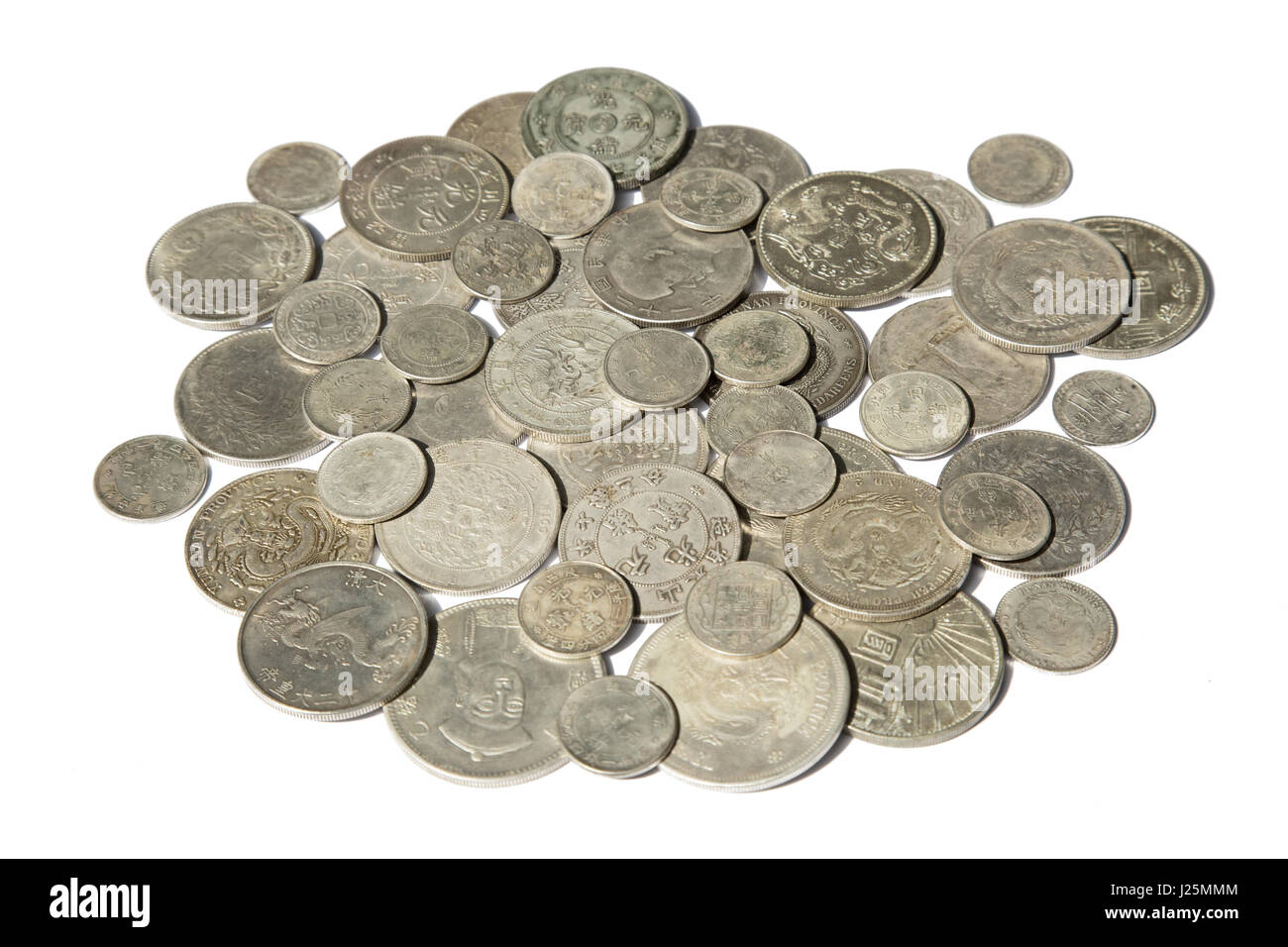 Huge pile of the old Chinese silver coins Stock Photo - Alamy