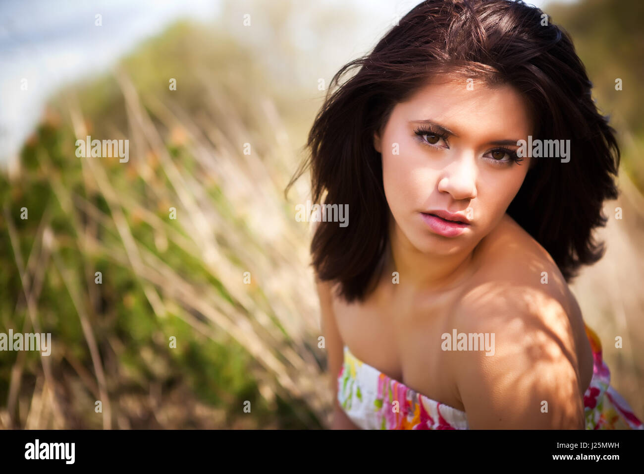 A portrait of a beautiful mixed race girl outdoor Stock Photo - Alamy