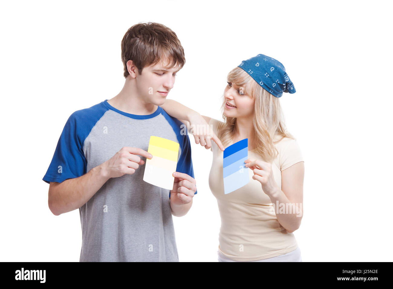 A shot of a young couple choosing paint colors Stock Photo - Alamy