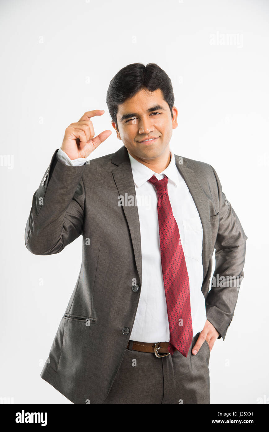 smart and young indian male businessman in business attire doing ...
