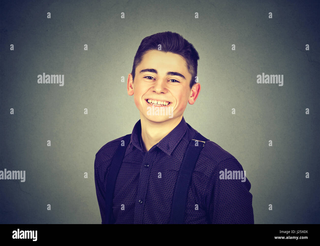 Portrait smiling modern man isolated on gray wall background Stock ...