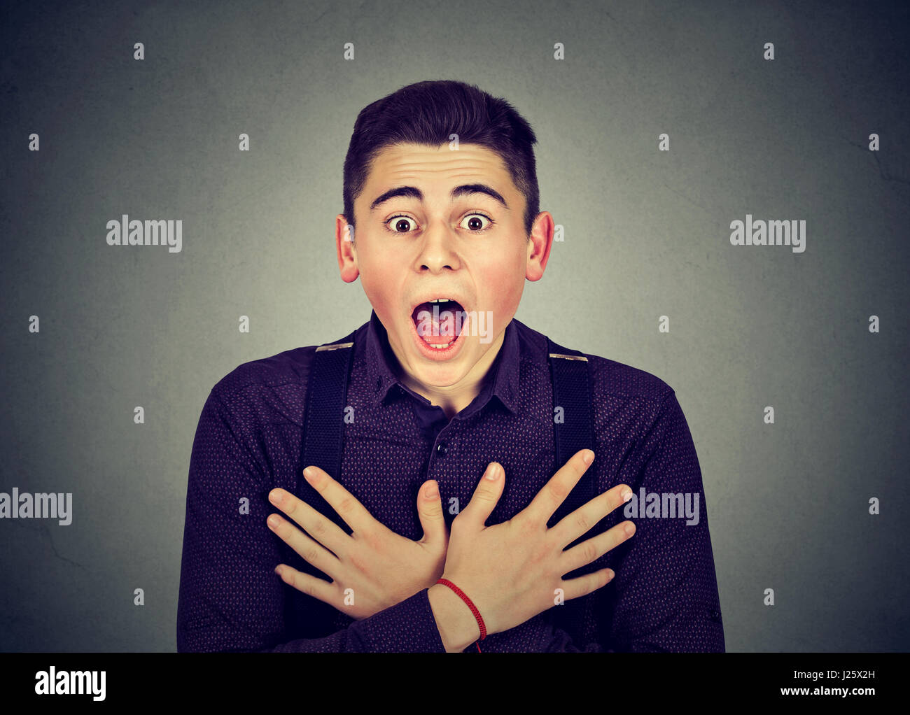 Shocked young man Stock Photo - Alamy