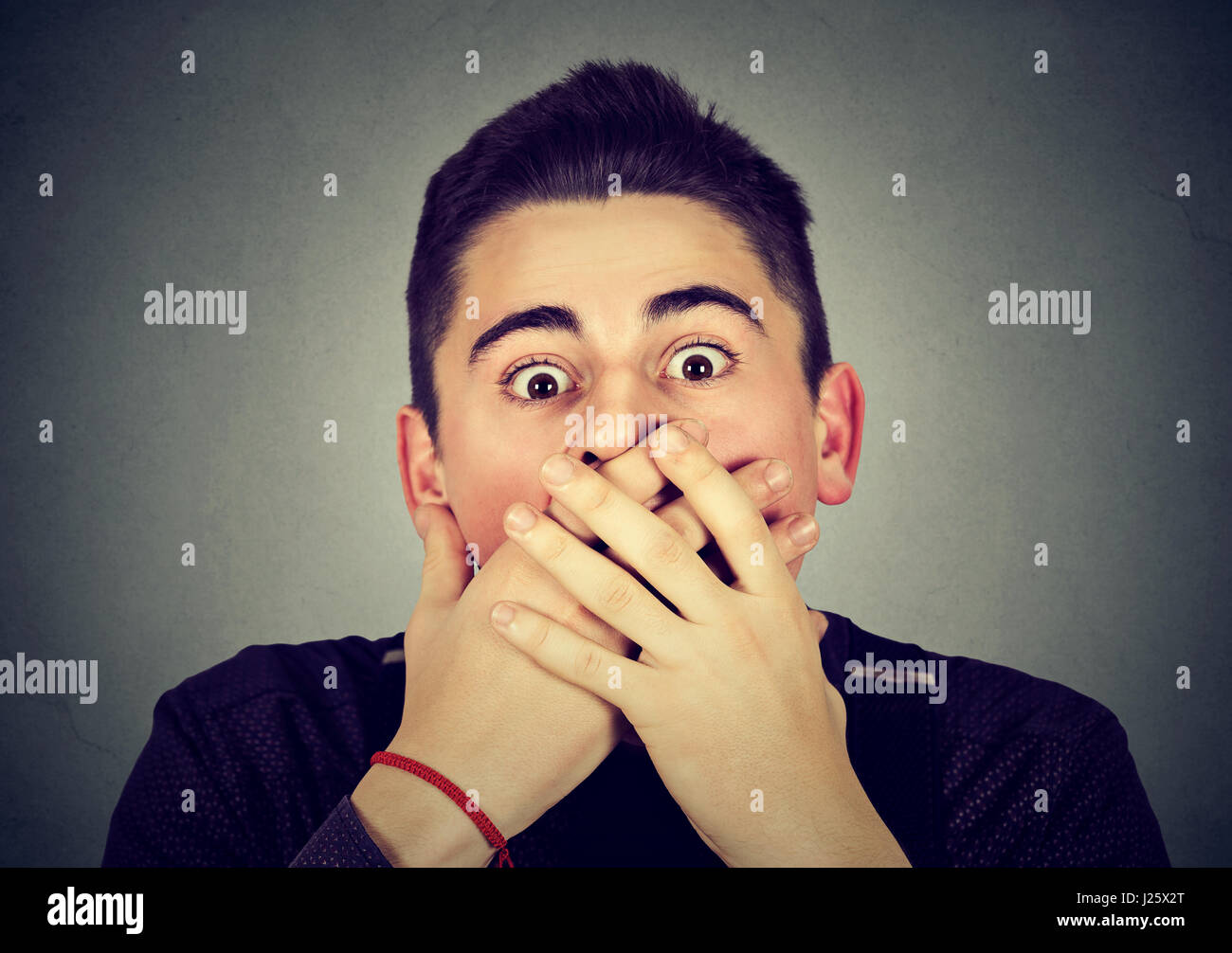 Scared stunned shocked young man Stock Photo - Alamy