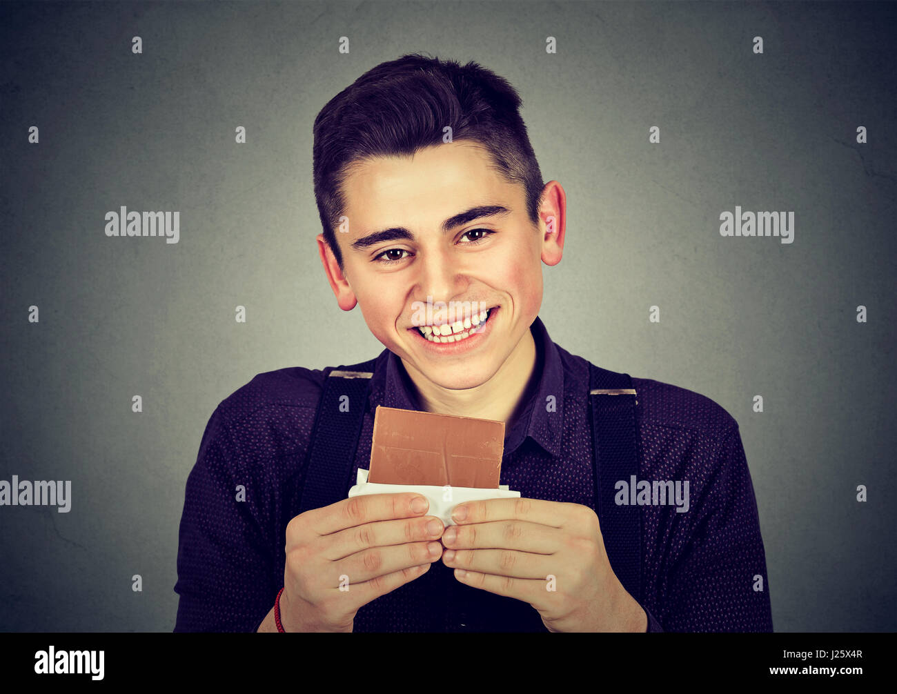 Man with candy bar hi-res stock photography and images - Alamy