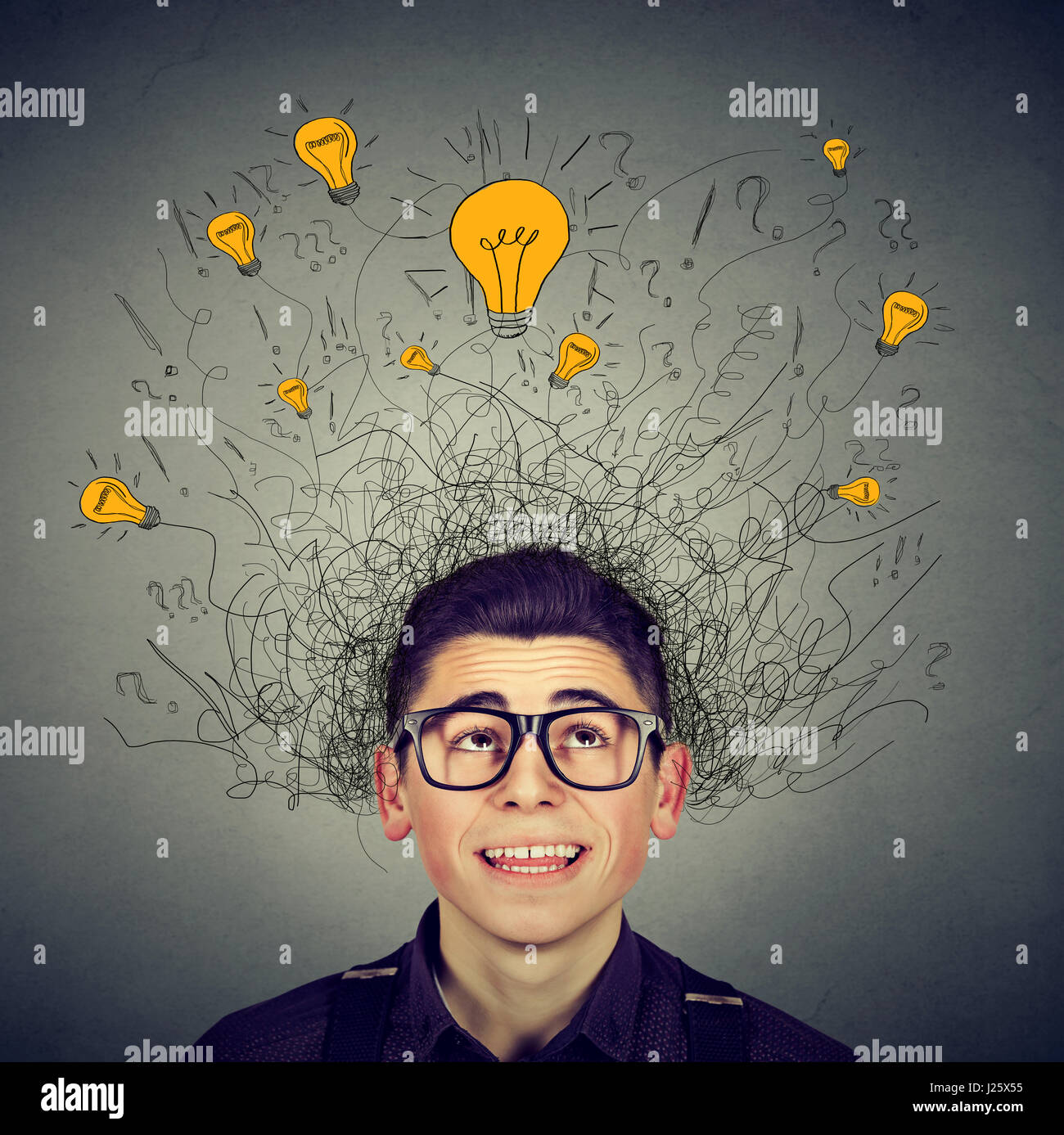 Brain connections. Excited man with many ideas light bulbs above head ...