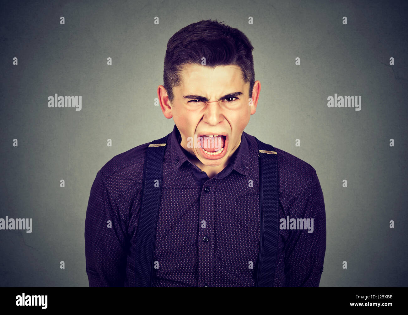 portrait of young angry man screaming Stock Photo - Alamy