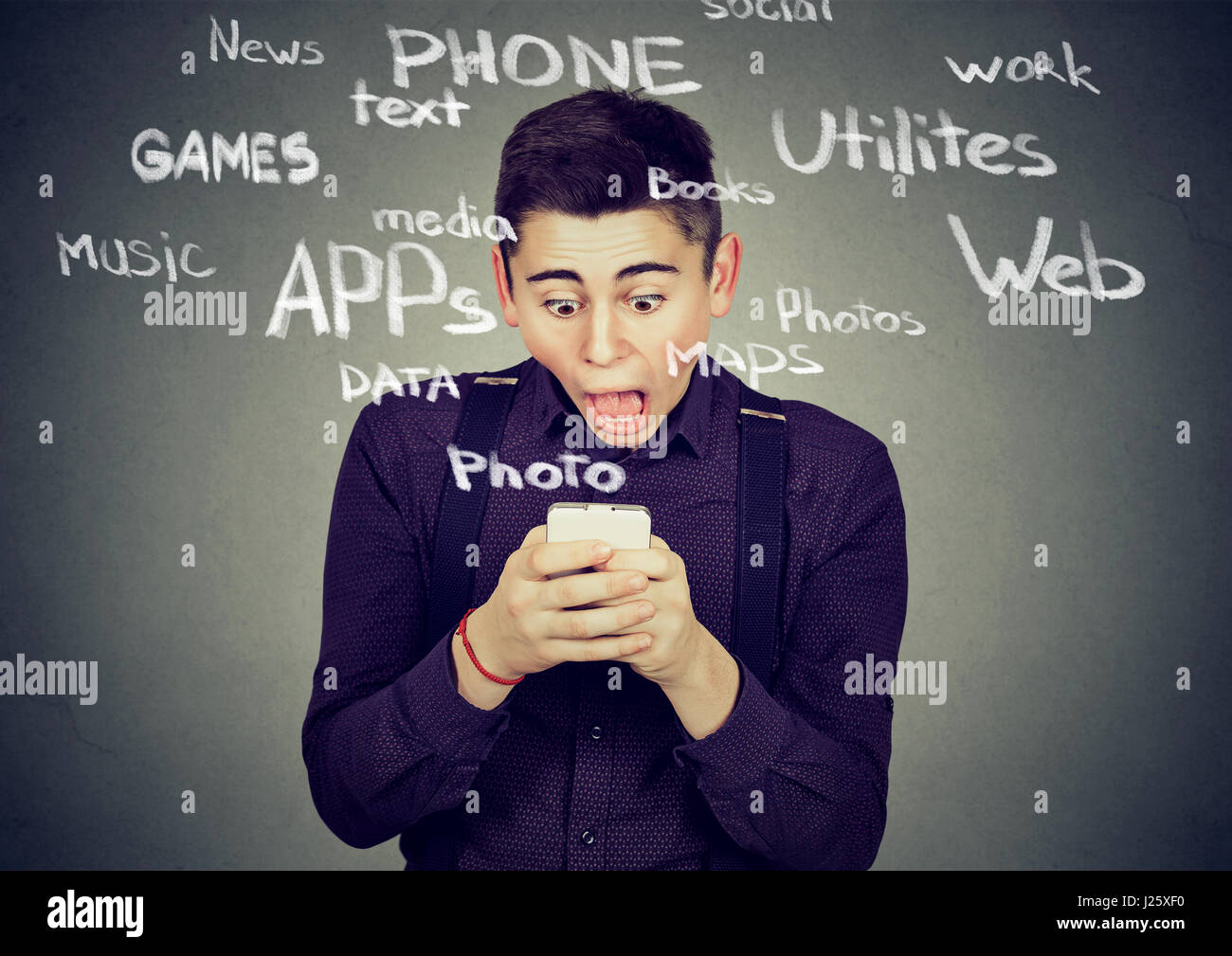 Shocked man using smart phone Stock Photo - Alamy