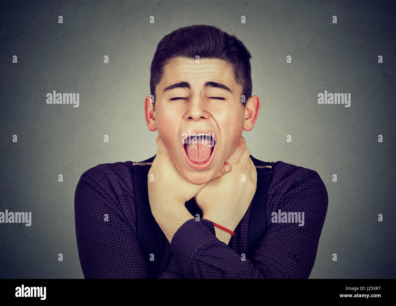 Young man having asthma attack or choking can't breath Stock Photo - Alamy