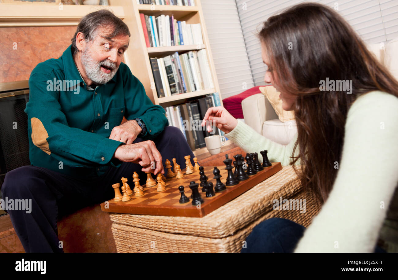 Senior playing chess Stock Photo - Alamy
