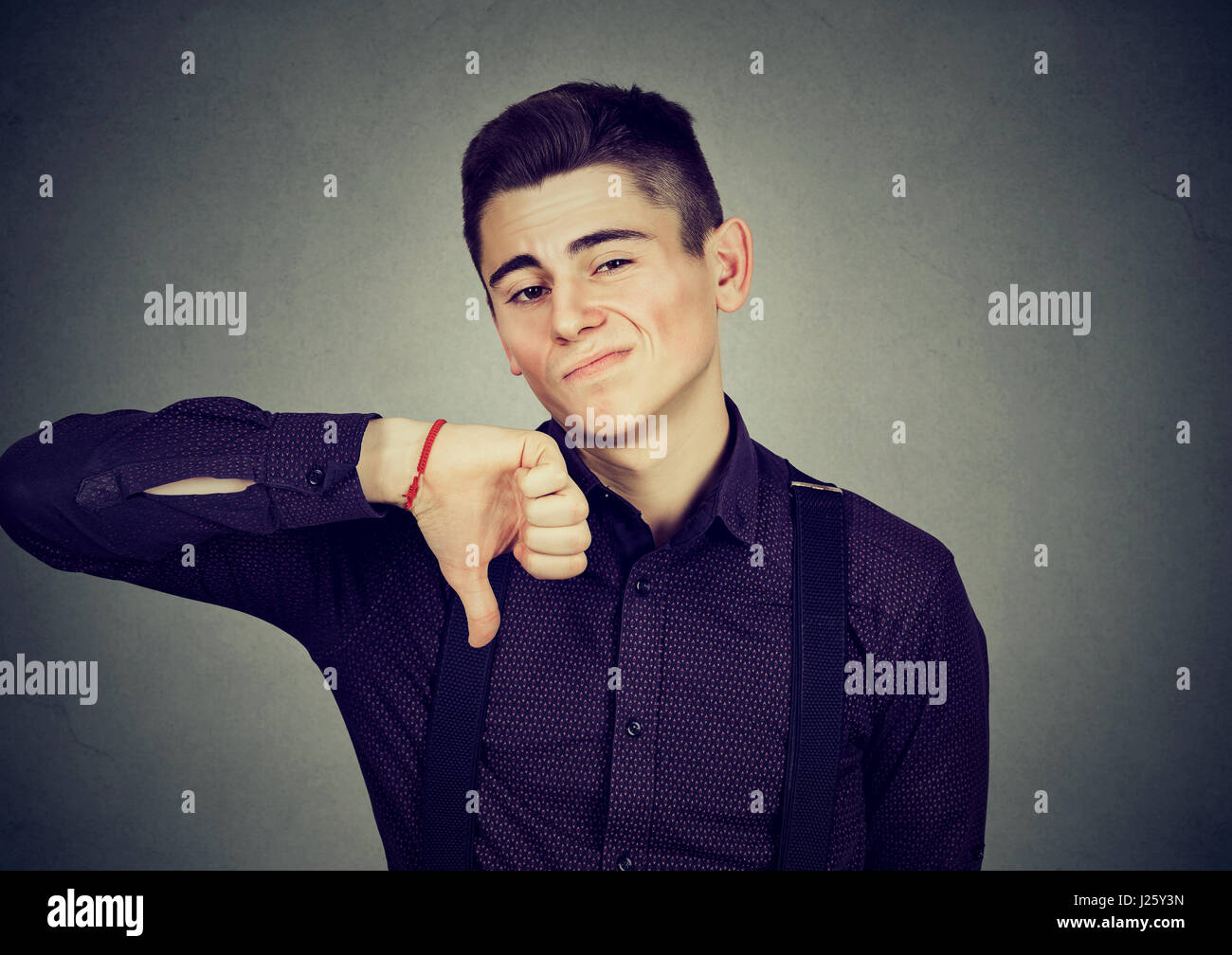 man with thumb down hand gesture Stock Photo - Alamy