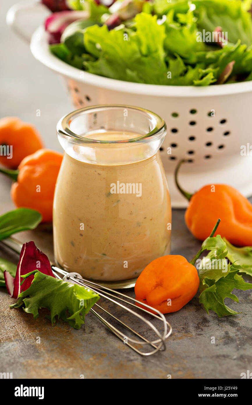 Homemade spicy ranch dressing with hot peppers Stock Photo - Alamy
