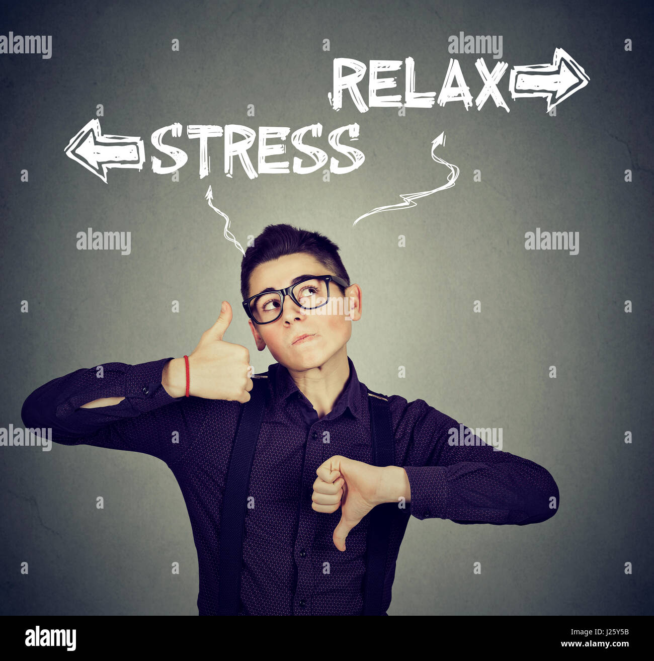 Stress or relax. Perplexed man with thumbs down thumbs up gesture Stock ...