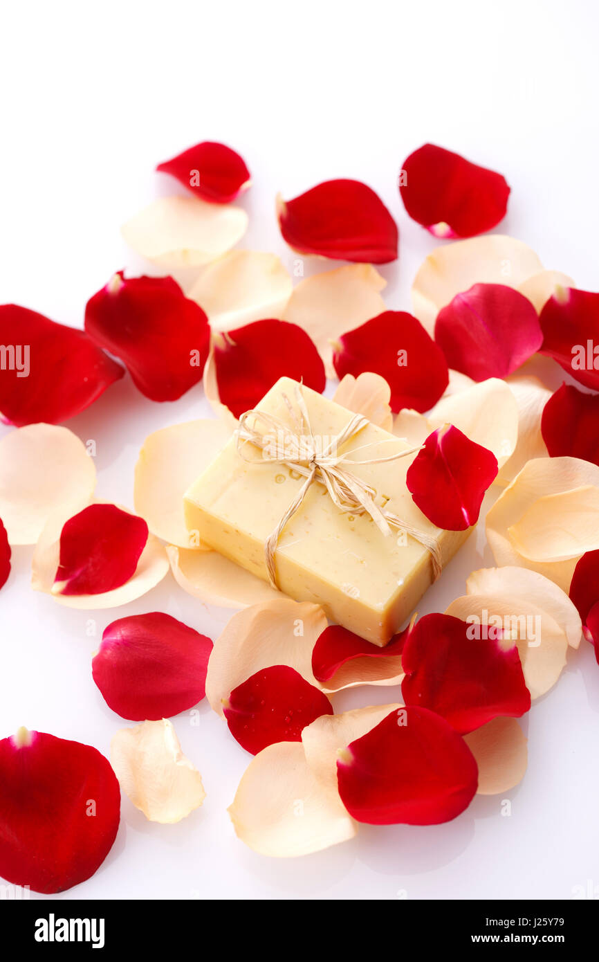 Rose petals and soap Stock Photo - Alamy