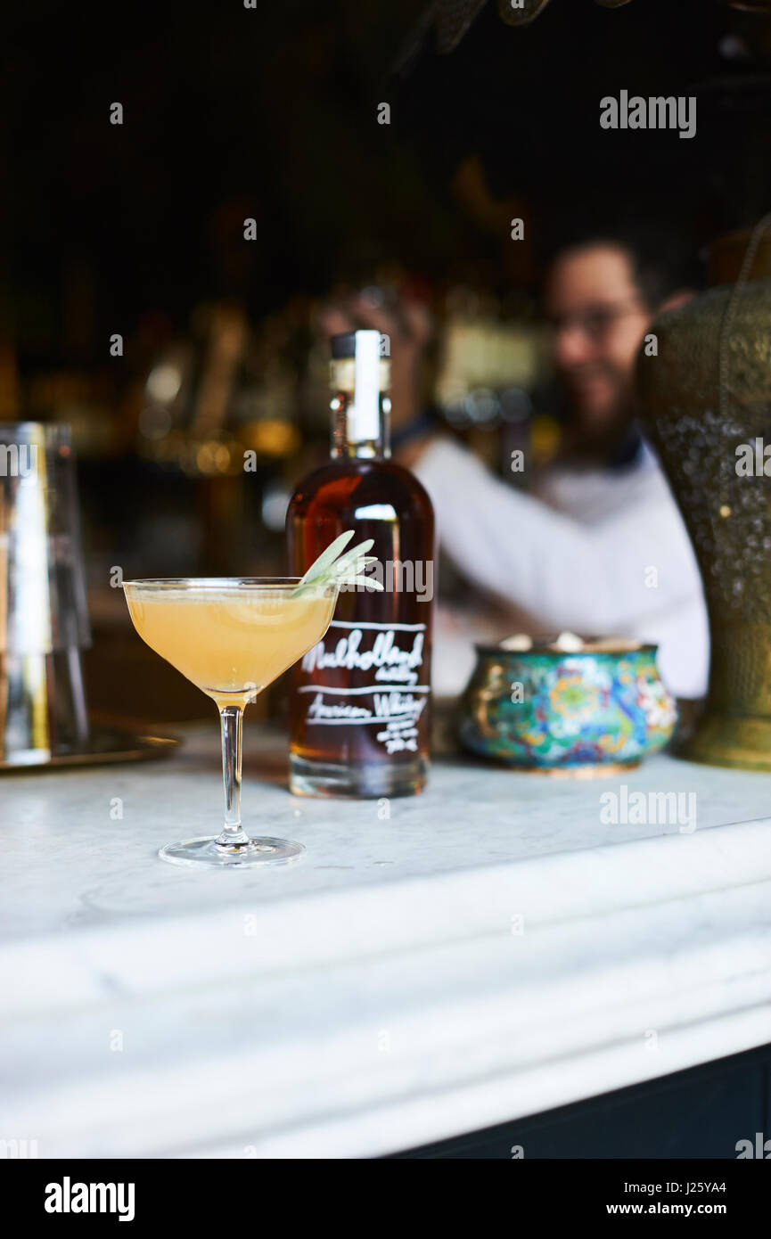 Mixologist crafting cocktails at bar stella in Los Angeles, CA Stock Photo - Alamy