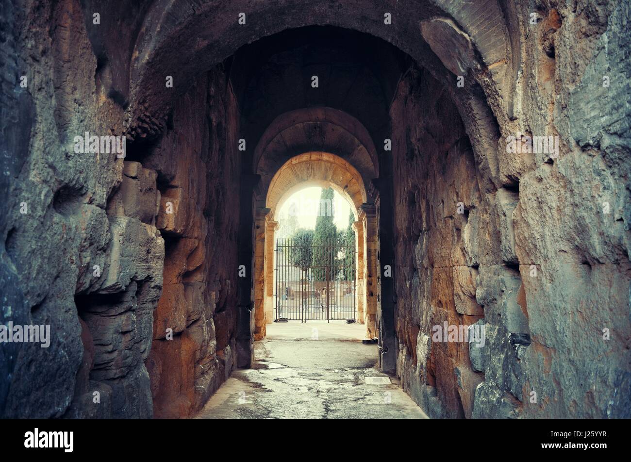 Archway in Colosseum, the world known landmark and the symbol of Rome ...