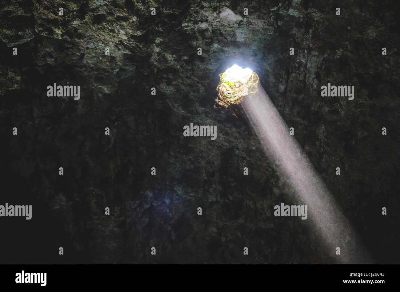 Light Shining Through Oculus of Green Cave, Island of Ravnik, Croatia ...