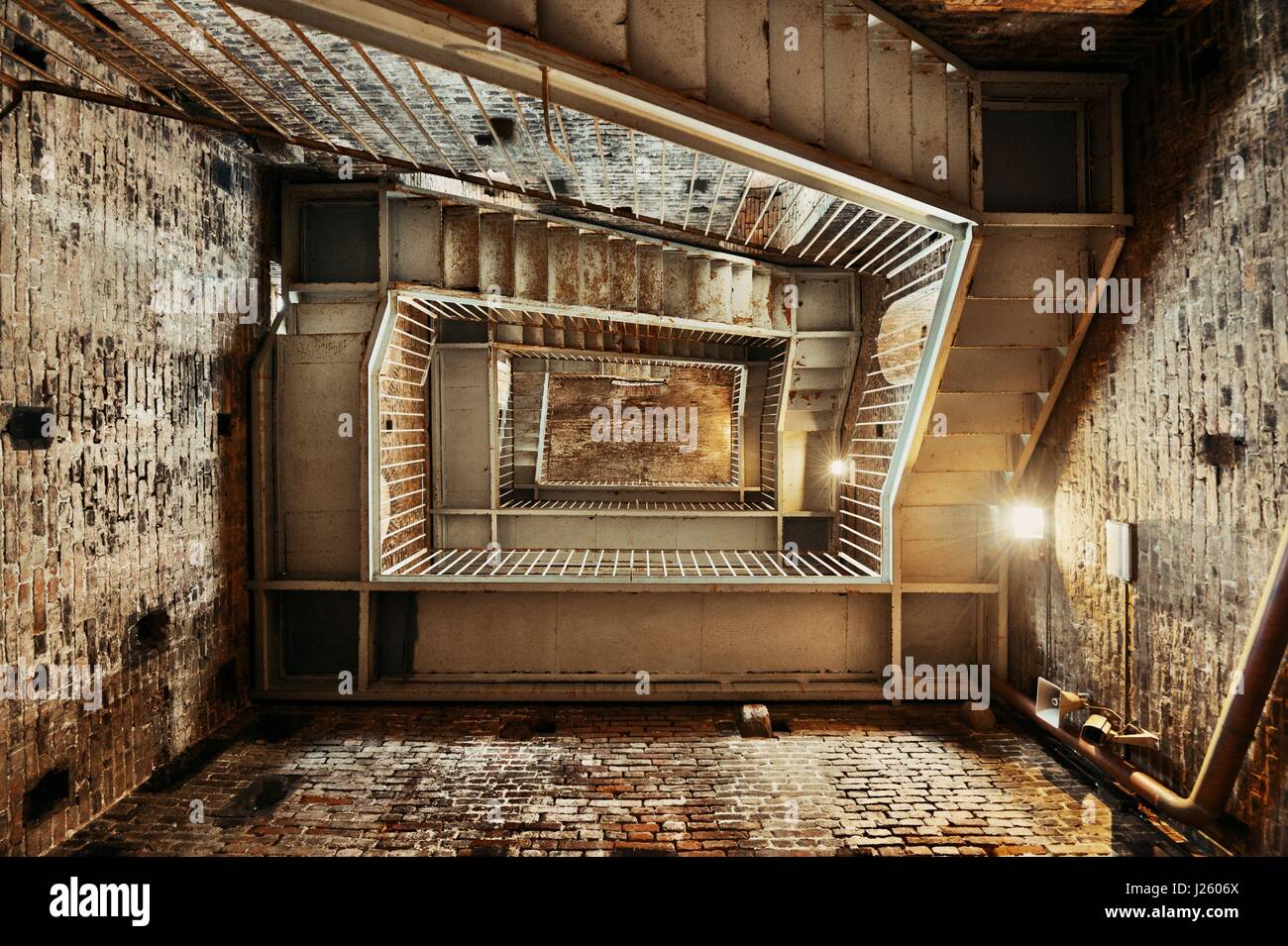 Staircase inside clock tower in Lucca with historic buildings in Italy ...