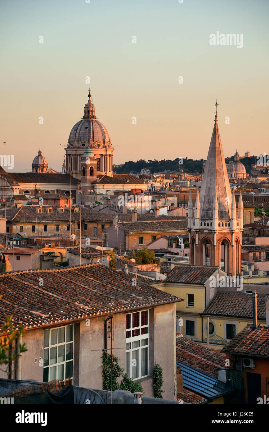 Rome rooftop view with ancient architecture in Italy at sunset moment ...