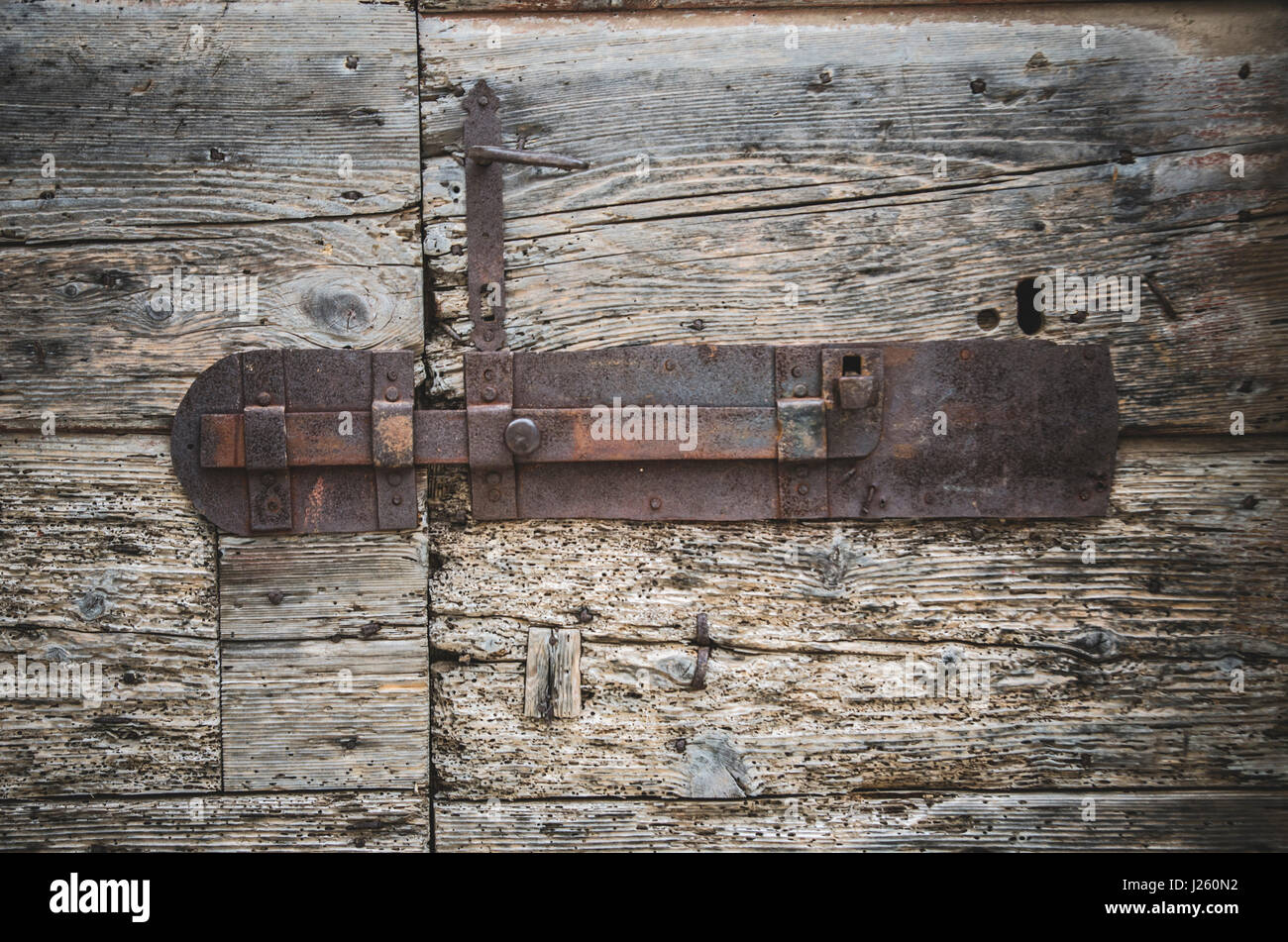 Rusty Old Slide Lock on Wooden Door, Bale, Croatia Stock Photo - Alamy