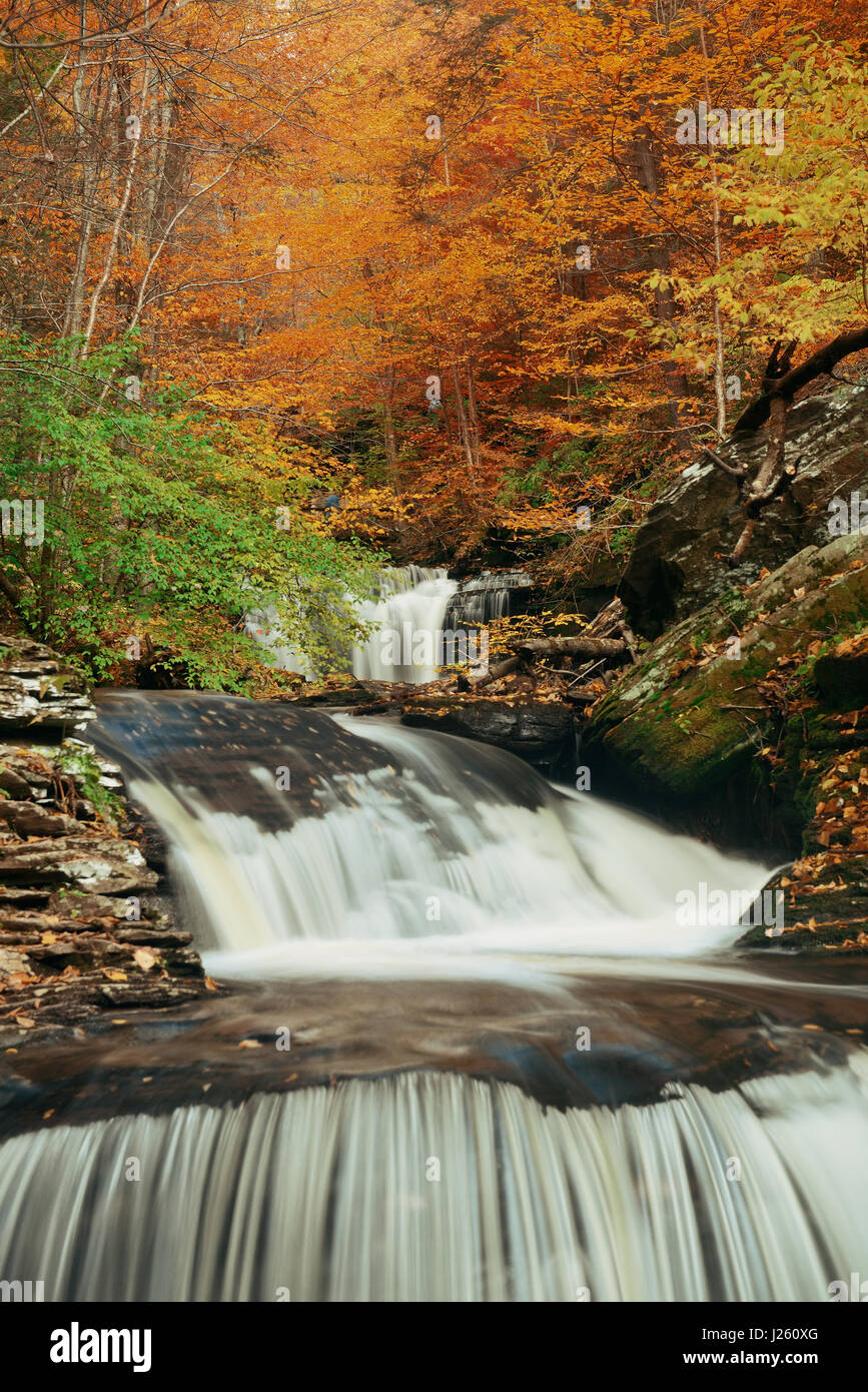 Autumn waterfalls in park with colorful foliage Stock Photo - Alamy