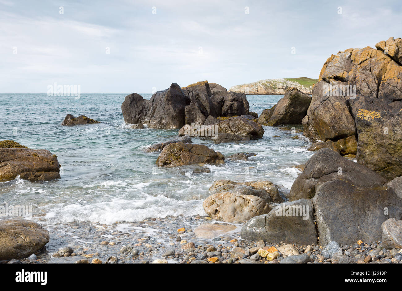 Rocky bay close to Cemaes Bay in Anglesey, North Wales Stock Photo - Alamy