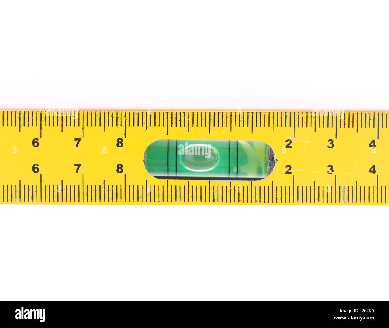 Yellow level on a white background Stock Photo - Alamy