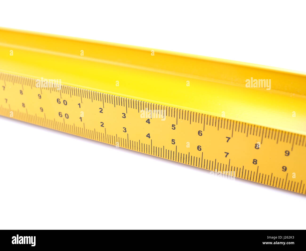 Yellow level on a white background Stock Photo - Alamy