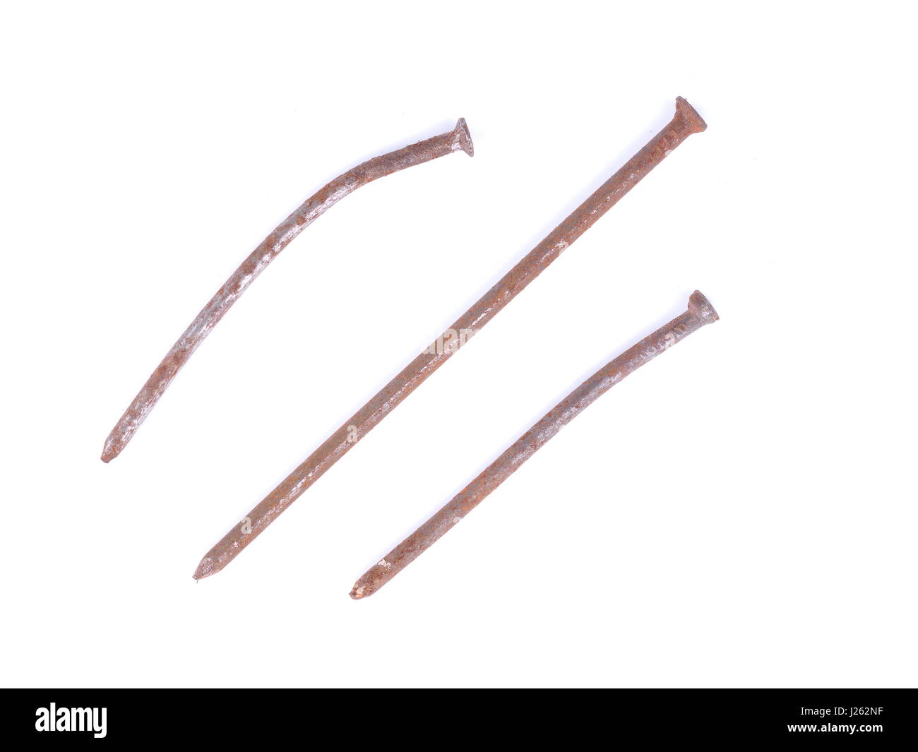 Old rusty nails on a white background Stock Photo - Alamy