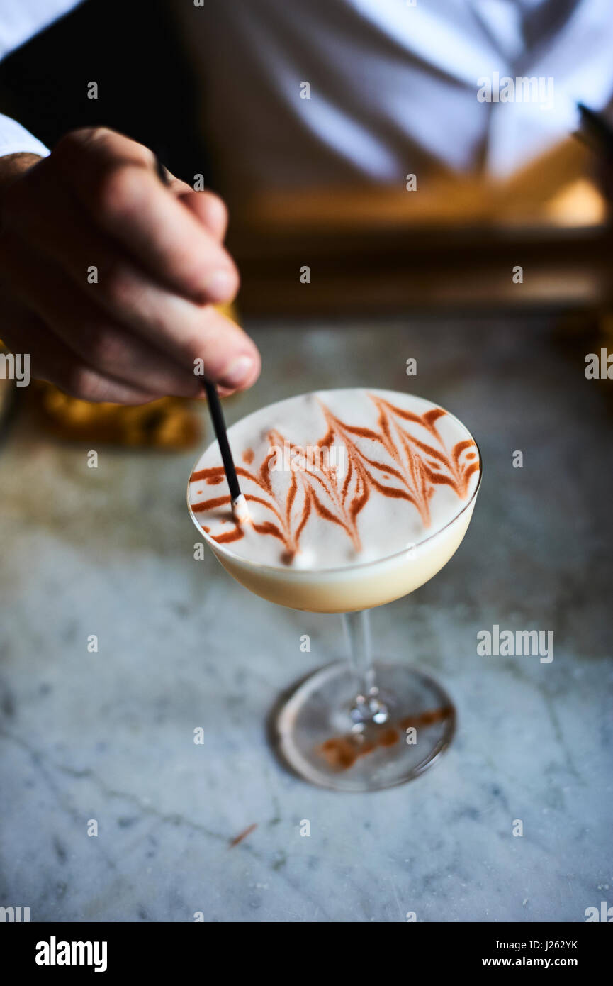 Mixologist crafting cocktails at bar stella in Los Angeles, CA Stock Photo - Alamy