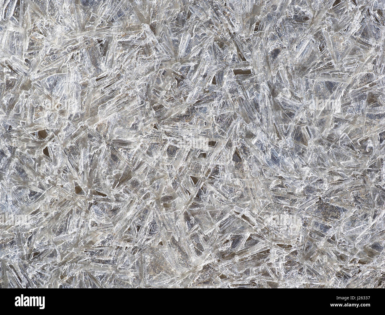 Ice in a puddle. background Stock Photo - Alamy