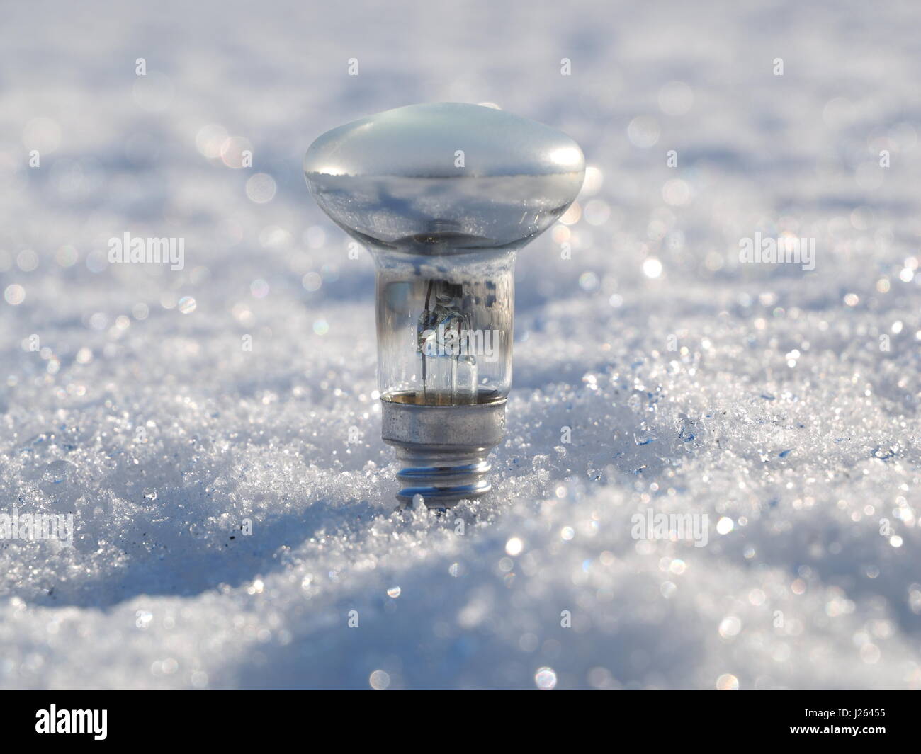 light bulb in the snow Stock Photo - Alamy