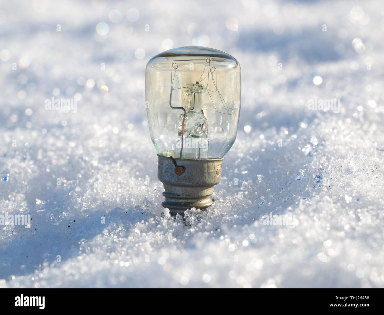 light bulb in the snow Stock Photo - Alamy