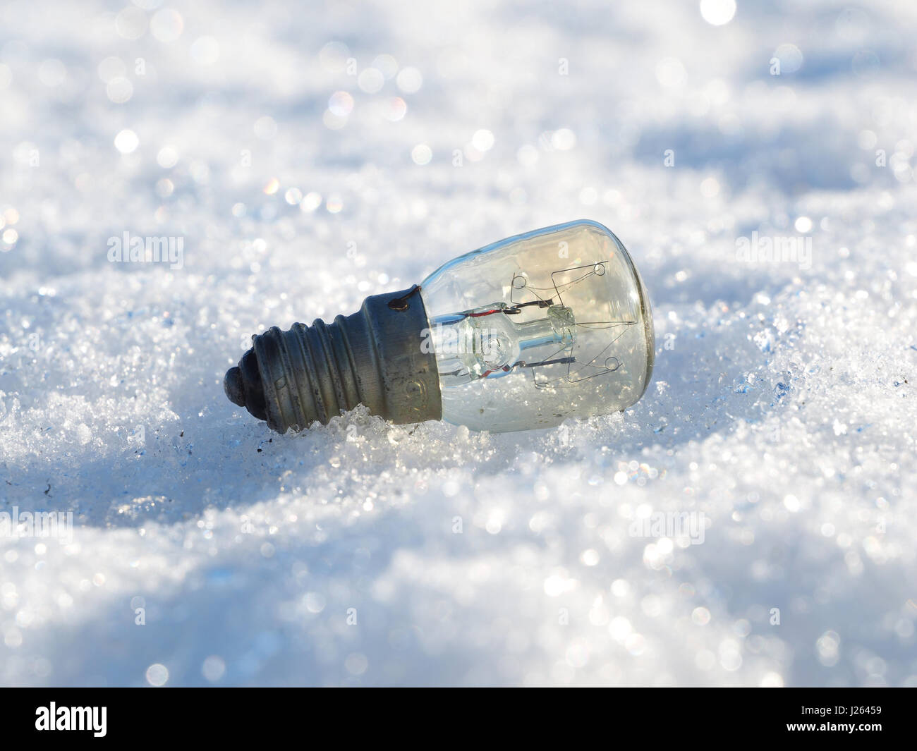 light bulb in the snow Stock Photo - Alamy