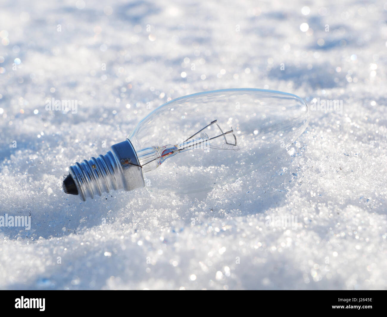 light bulb in the snow Stock Photo - Alamy
