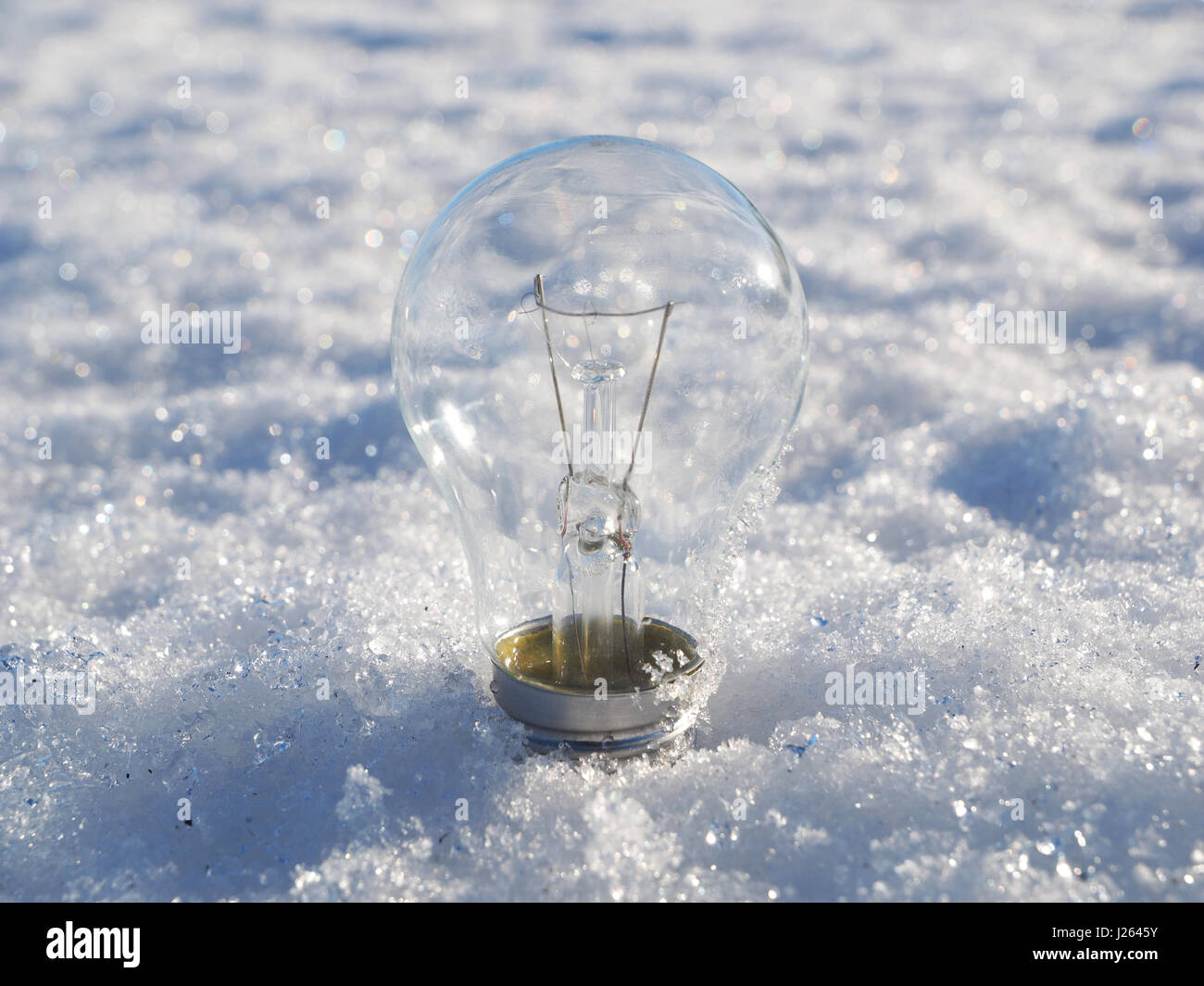 light bulb in the snow Stock Photo - Alamy