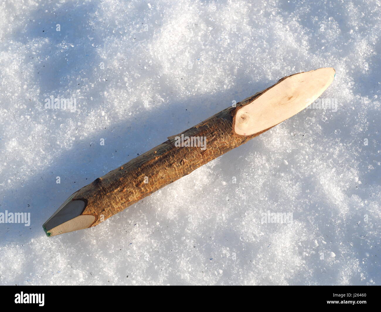 Pencil in the snow Stock Photo - Alamy