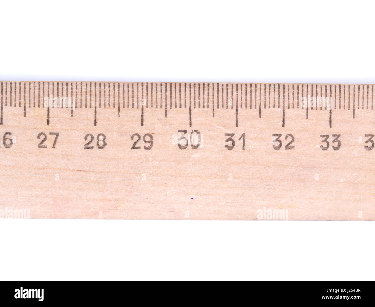 wooden ruler on a white background Stock Photo - Alamy