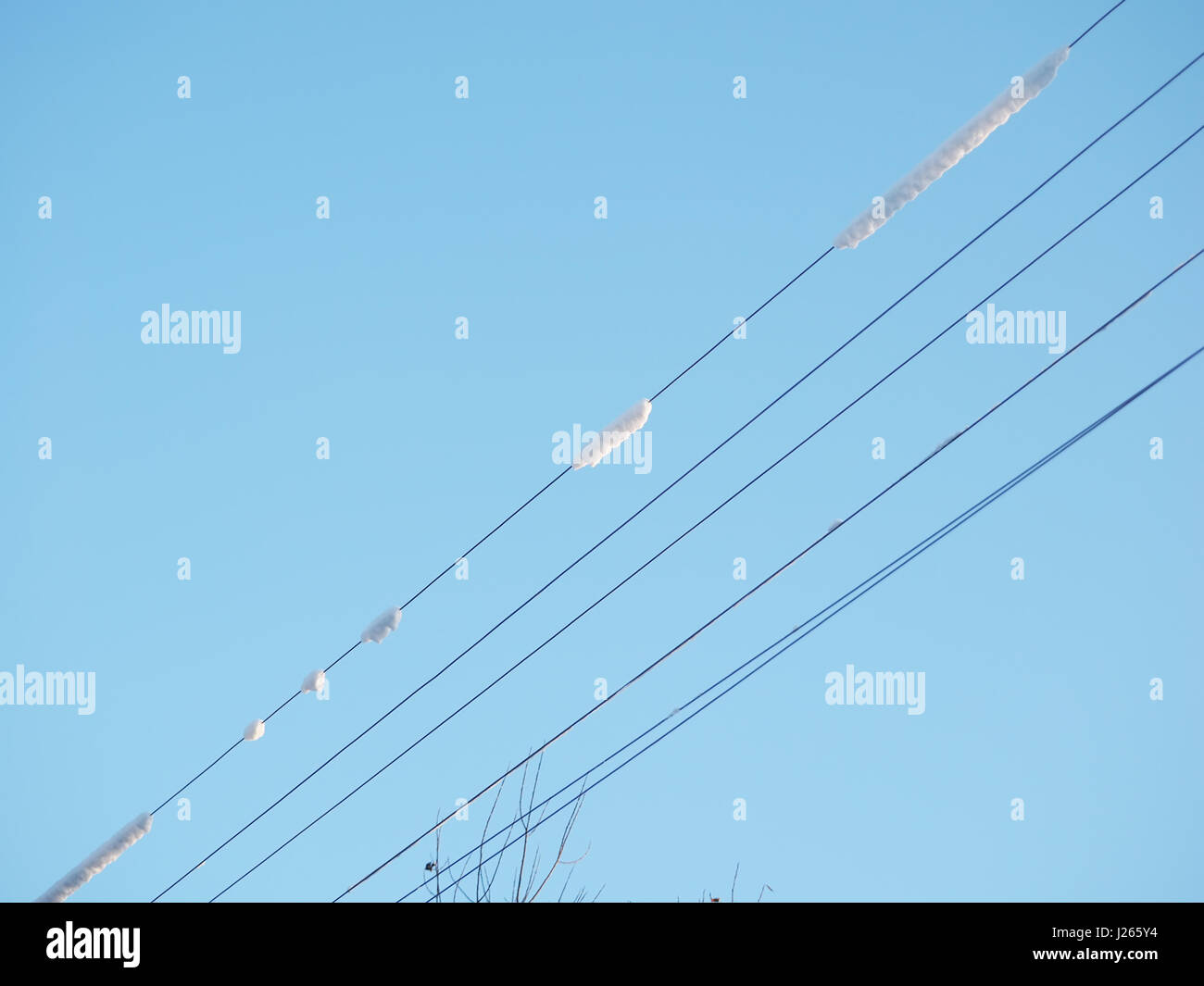 electrical wires in the ice Stock Photo - Alamy