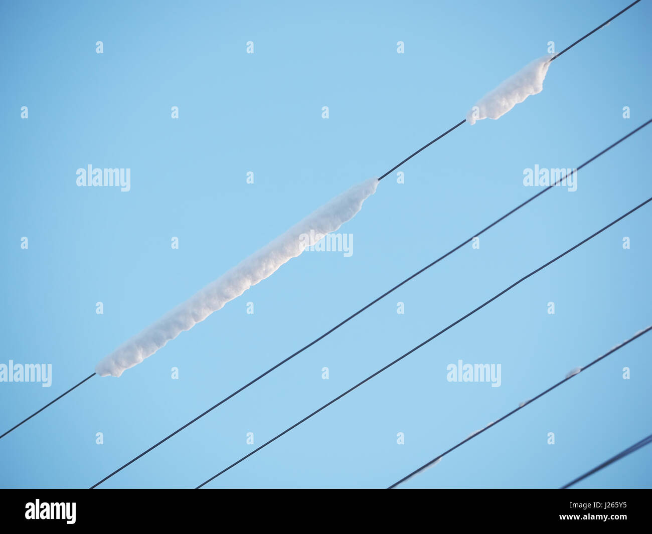 electrical wires in the ice Stock Photo - Alamy