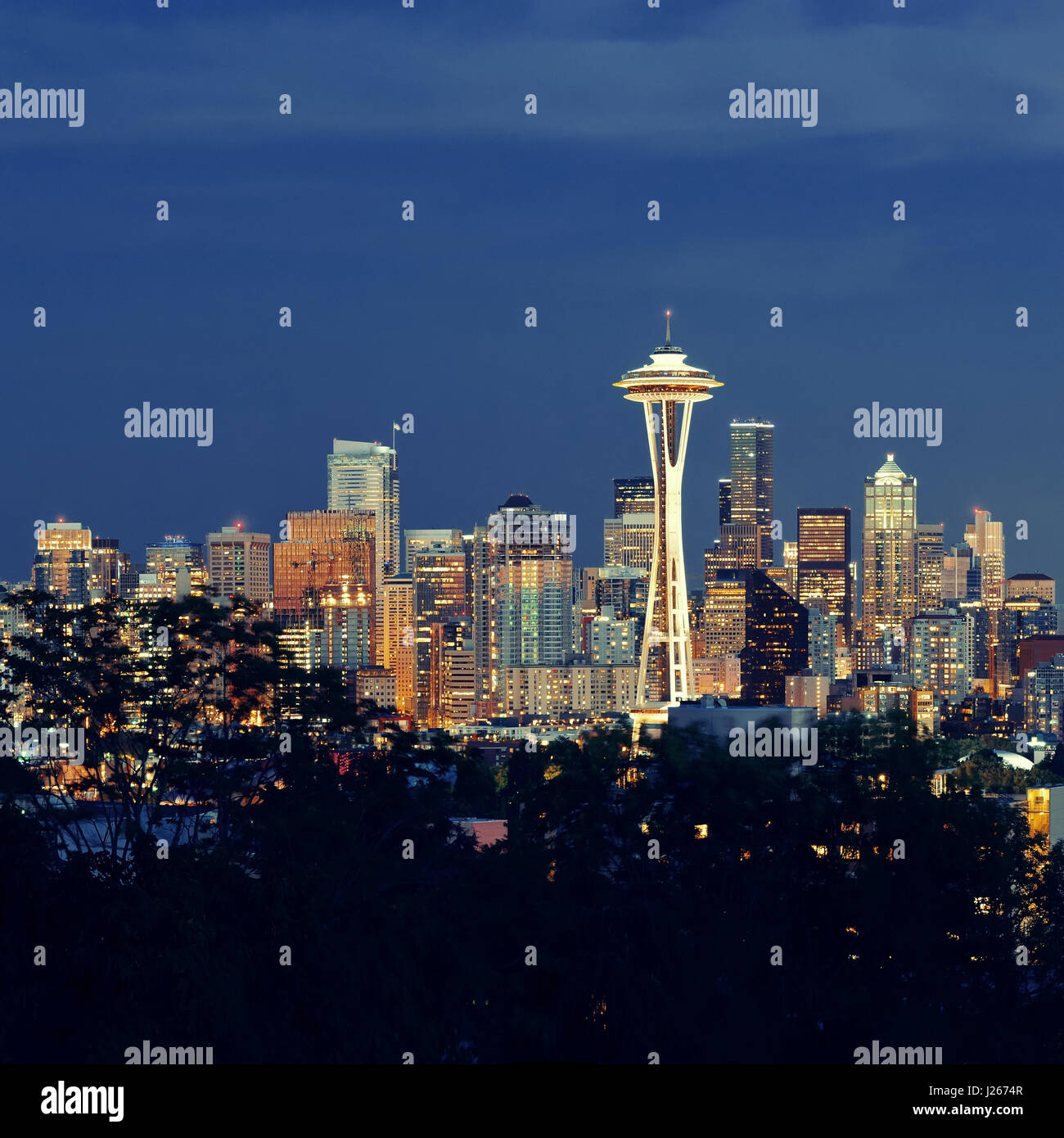 Seattle city skyline at night with urban office buildings viewed from ...