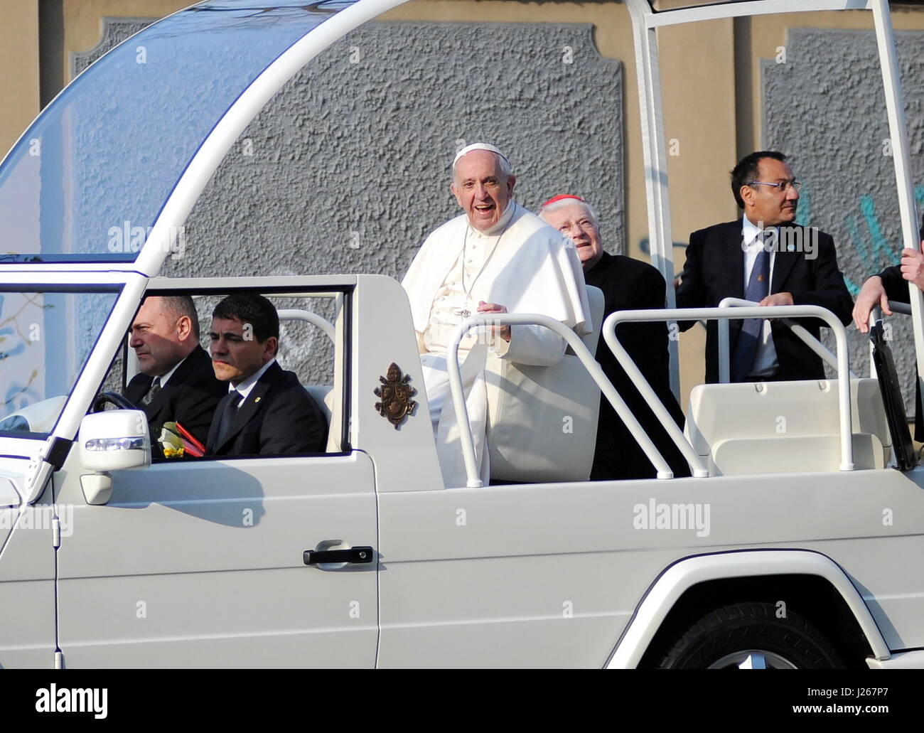 Pope Francis arrives in Milan for a one-day visit. The Pope passes ...