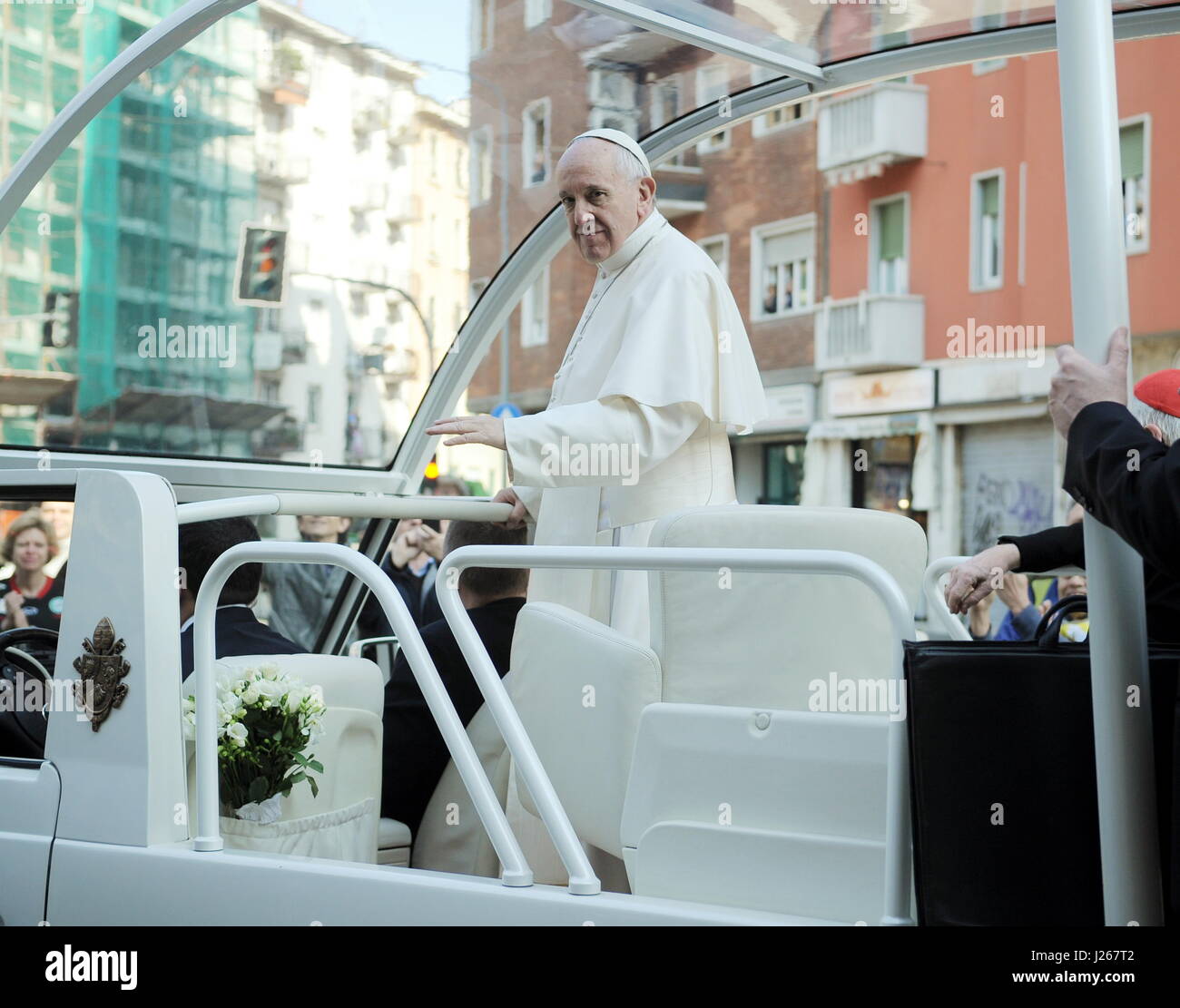 Pope Francis arrives in Milan for a one-day visit. The Pope passes ...