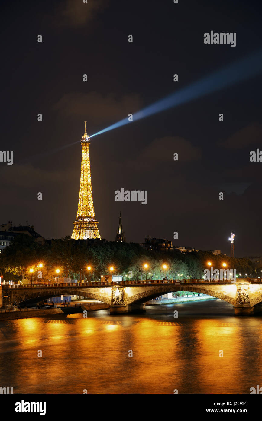PARIS, FRANCE - MAY 13: Eiffel Tower and River Seine at night on May 13 ...