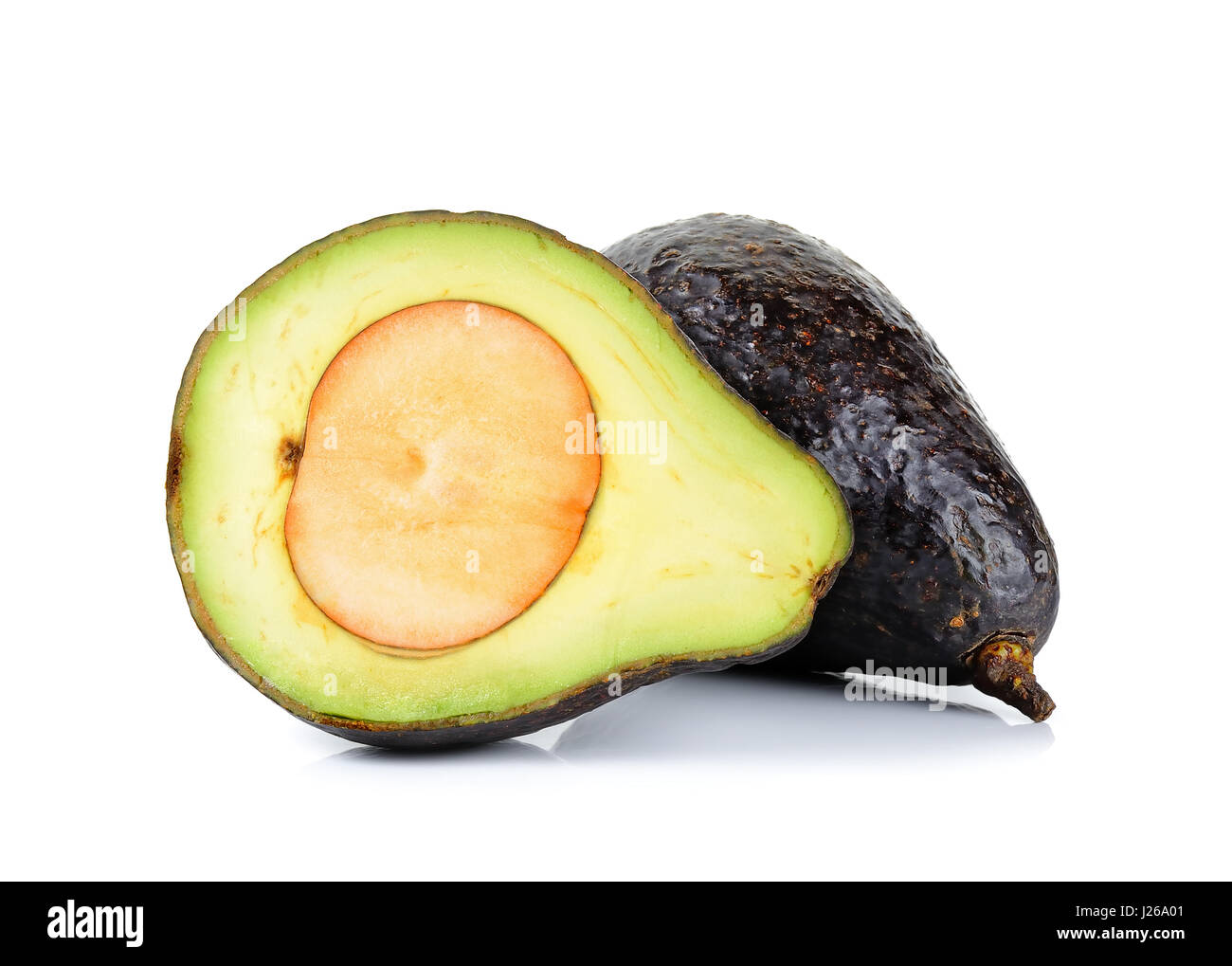 Sliced ripe avocado isolated on white background Stock Photo - Alamy