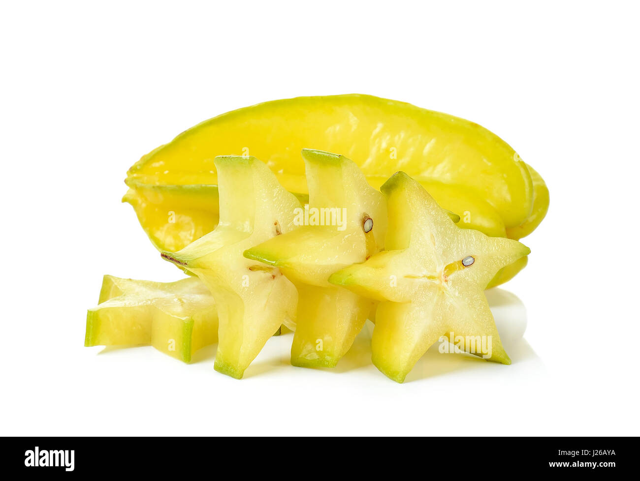 Sliced star apple isolated on the white background Stock Photo - Alamy